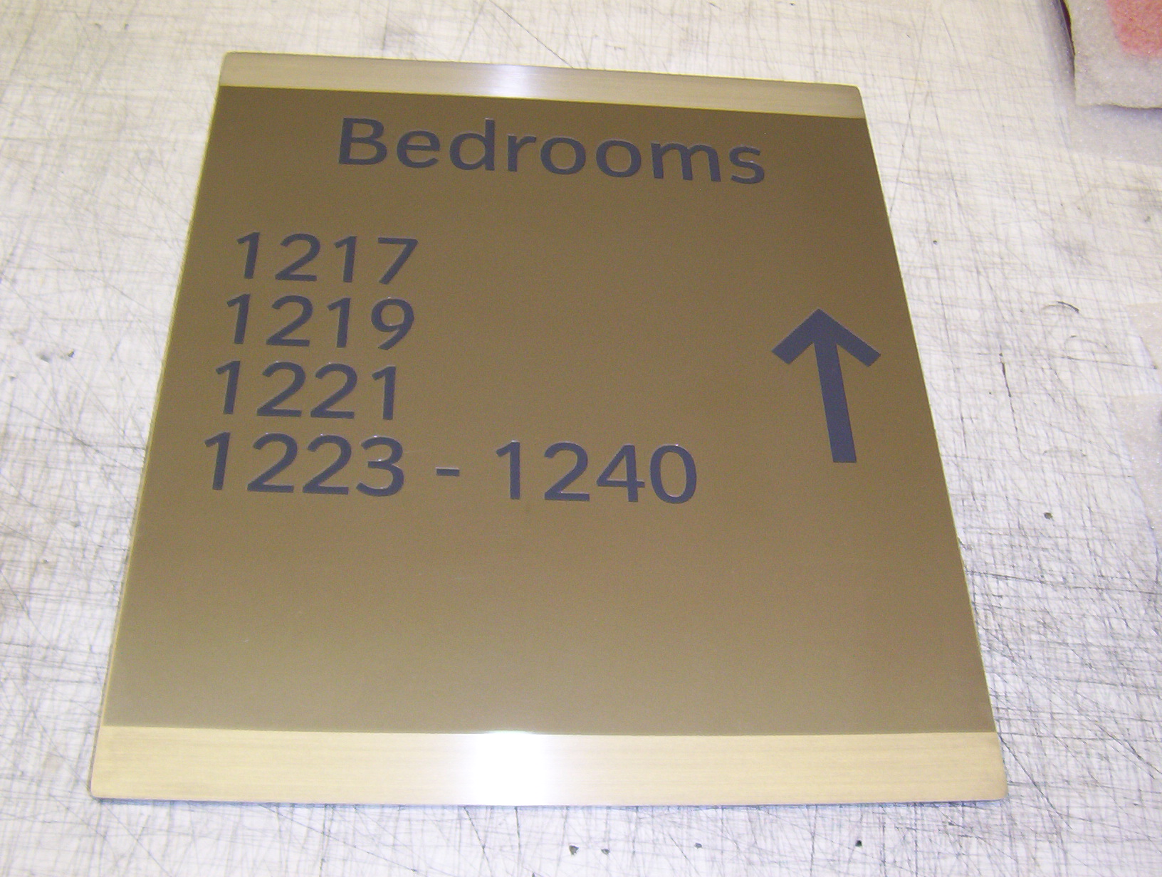 One of 2,000 shaded brass hotel signs - Sign Industries